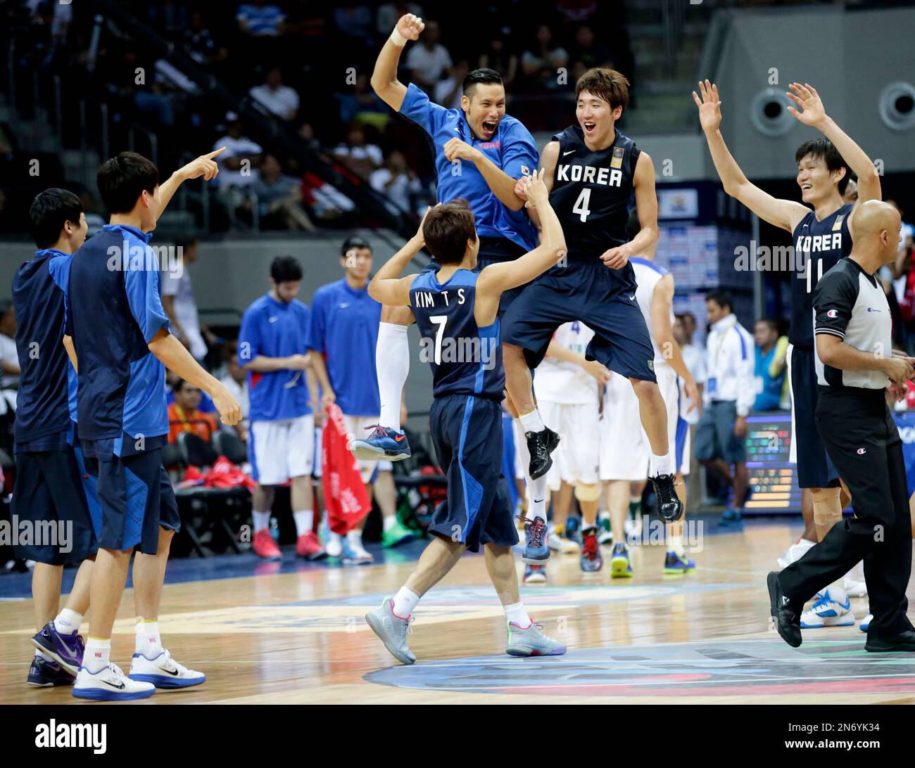 South Korea players celebrate their 75-57 win over Taiwan in the bronze ...