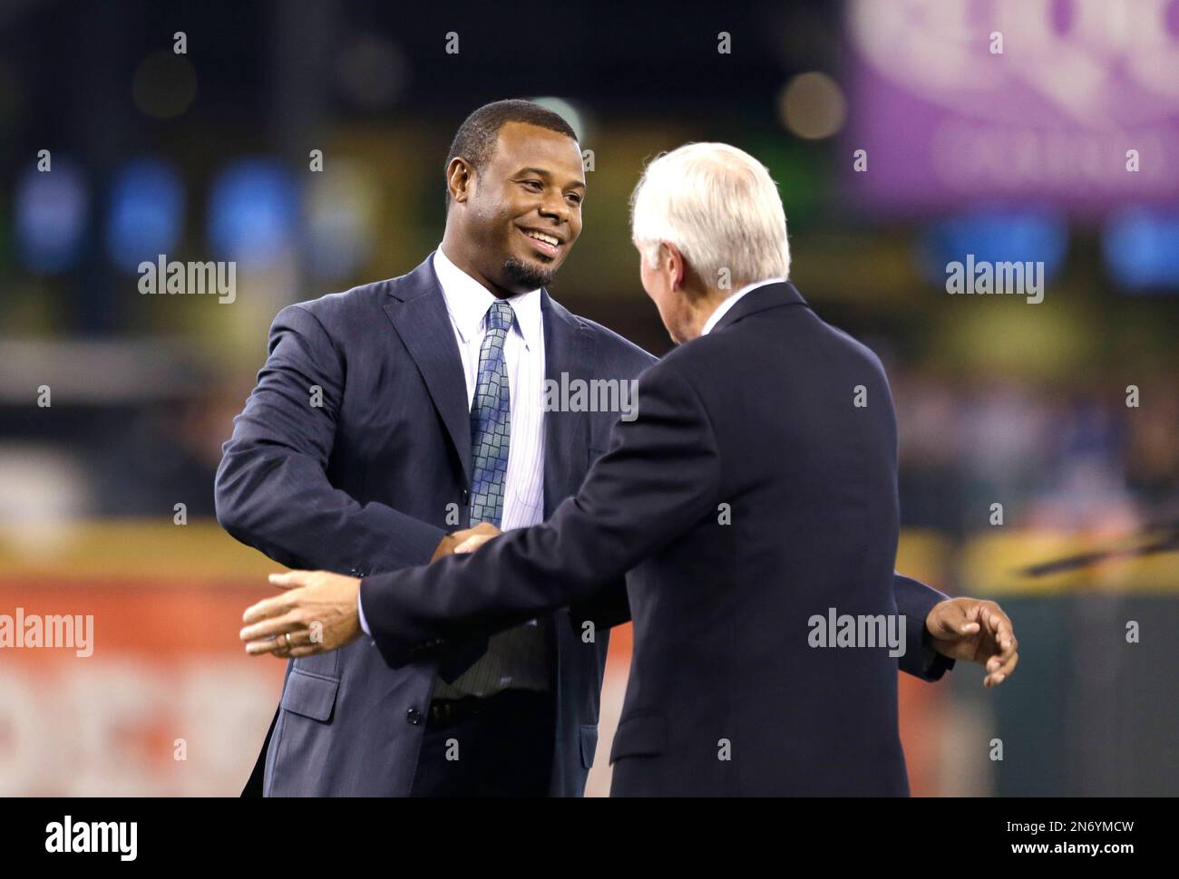 Former Seattle Mariners' outfielder Ken Griffey Jr., left, embraces ...
