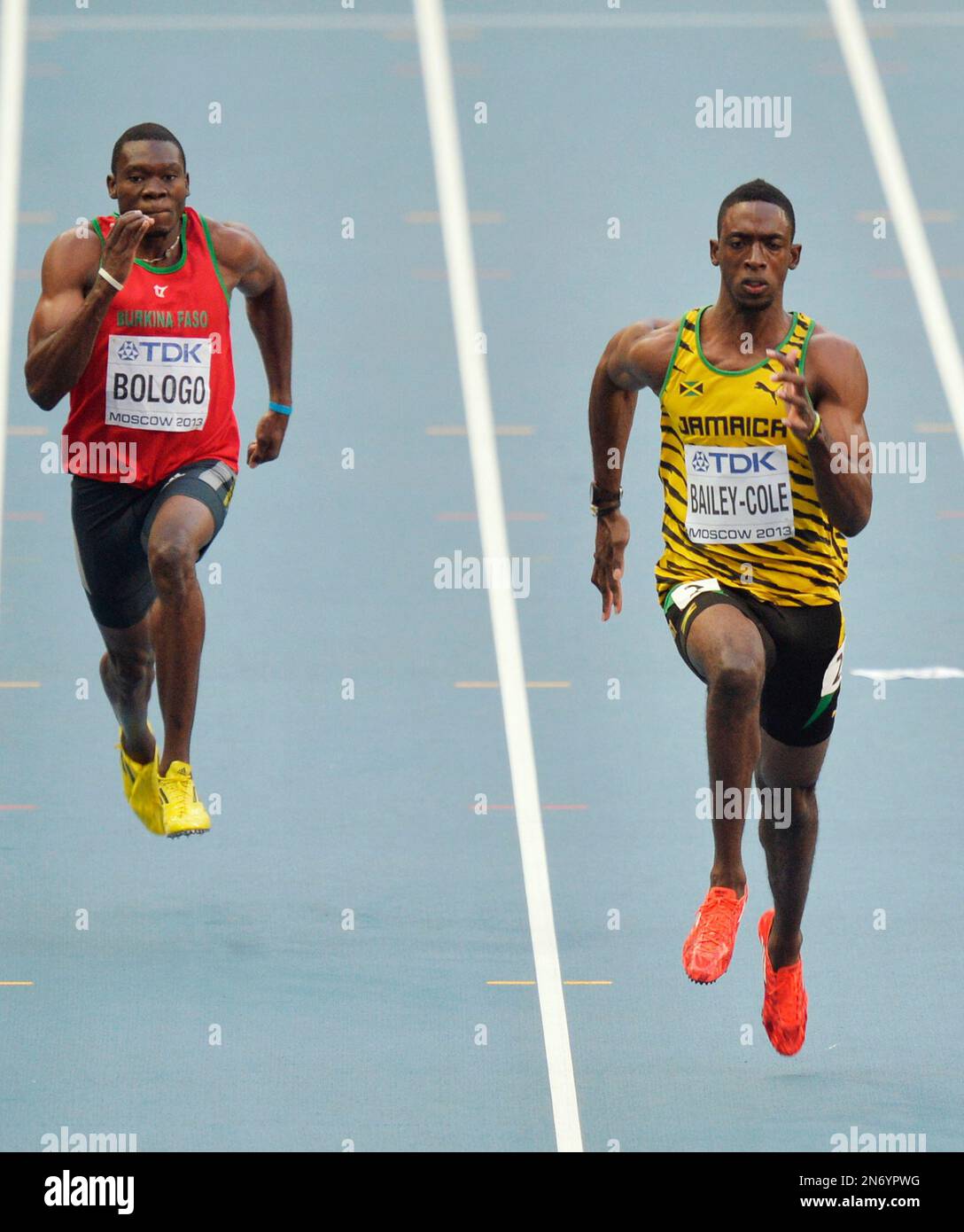 Jamaica's Kemar Bailey-Cole, right, and Burkina Faso's Innocent Bologo ...
