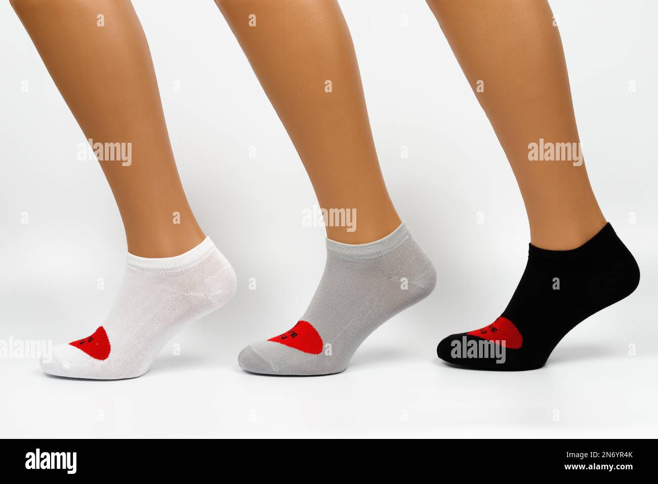Socks on a white background. Socks on the leg Stock Photo - Alamy