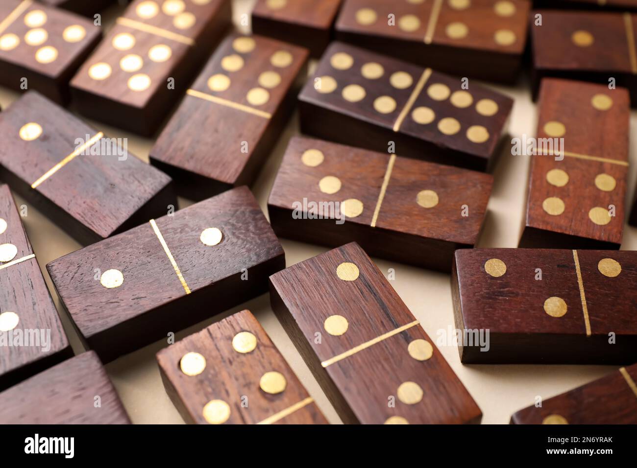 Wooden domino tiles on beige background, closeup Stock Photo - Alamy