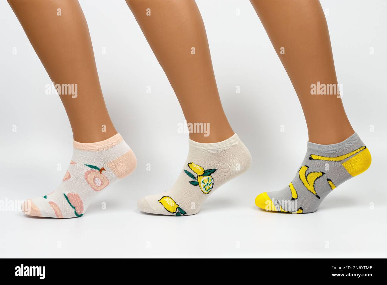 Socks on a white background. Socks on the leg Stock Photo - Alamy