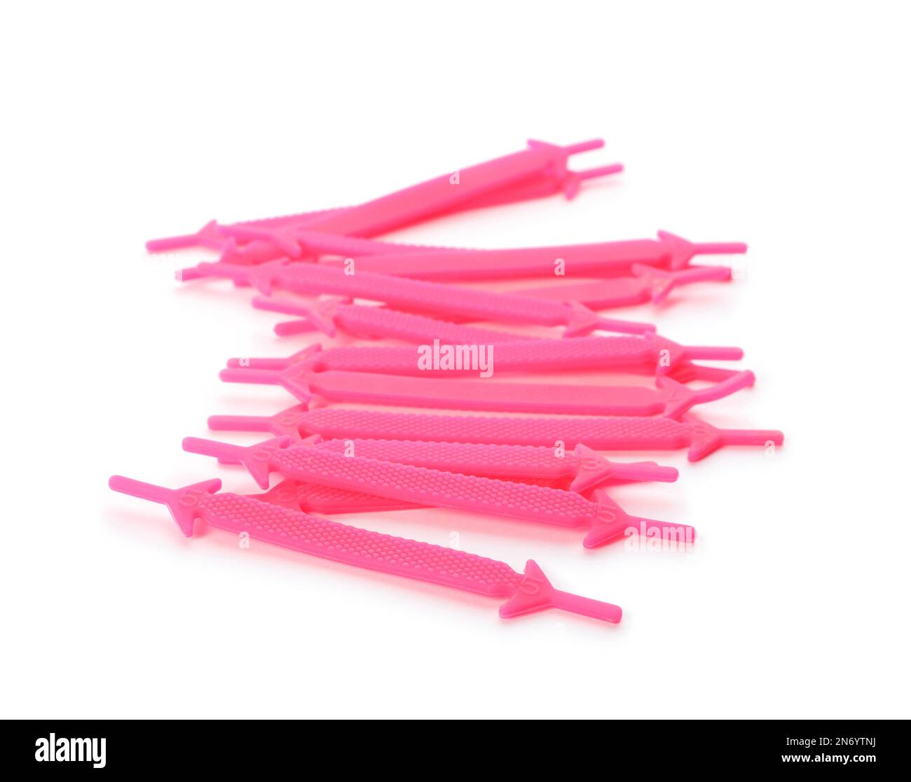 Pink silicone shoe laces on white background Stock Photo - Alamy