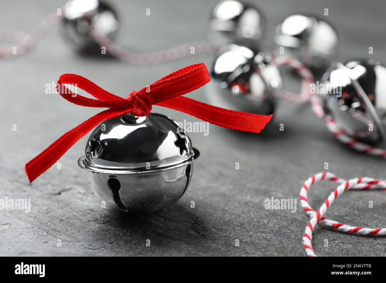 Silver ribbon bow jingle bell hi-res stock photography and images - Alamy