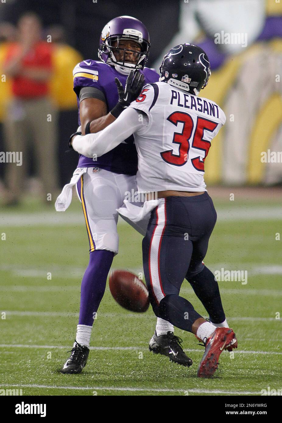 Minnesota Vikings wide receiver Jarius Wright, left, is hit by Houston ...