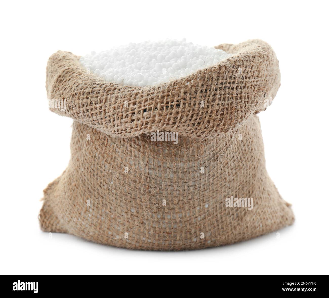 Pellets of ammonium nitrate in bag isolated on white. Mineral ...