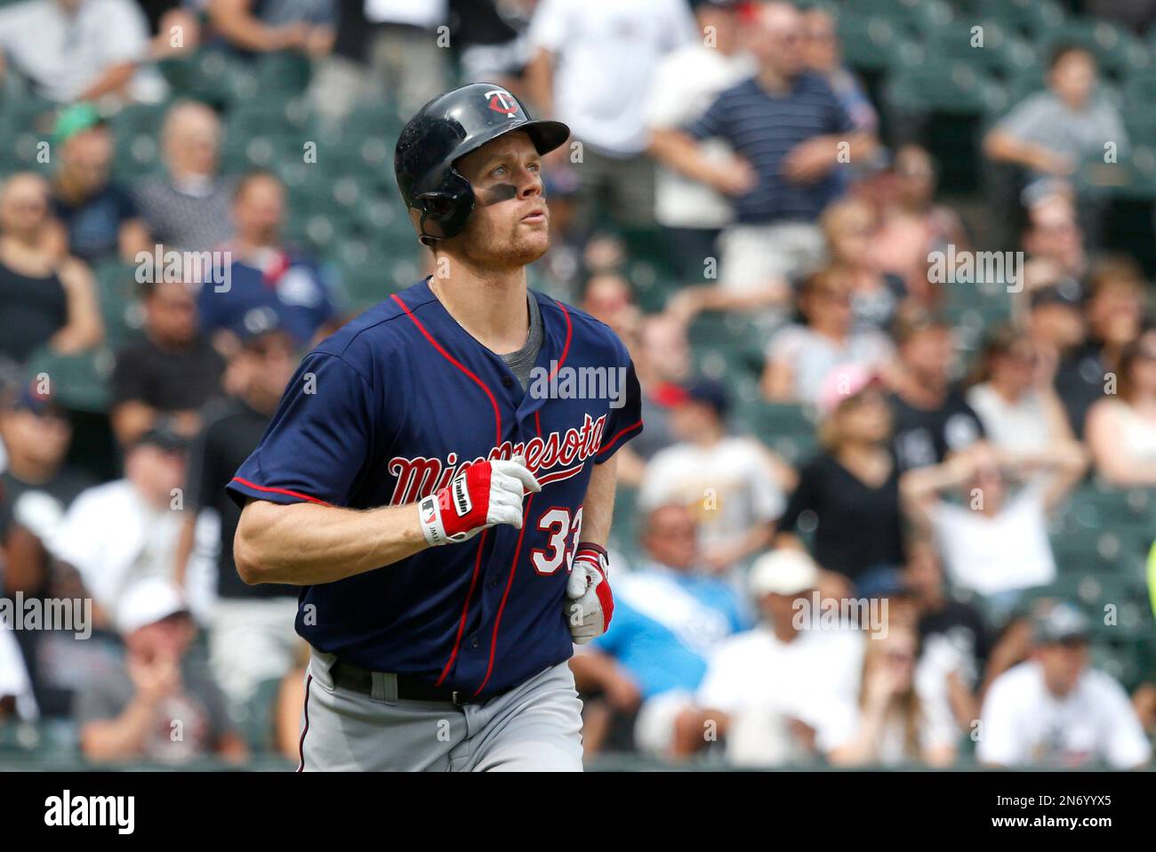 Minnesota Twins' Justin Morneau watches his grand slam off Chicago ...
