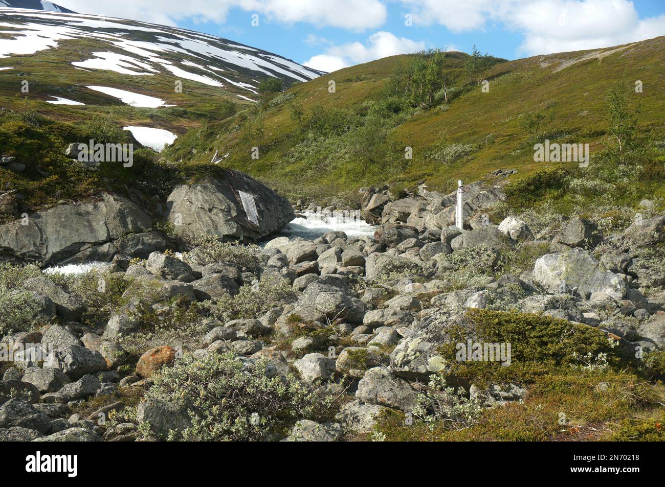 Remains of old broken bridge over mountain stream Stock Photo - Alamy