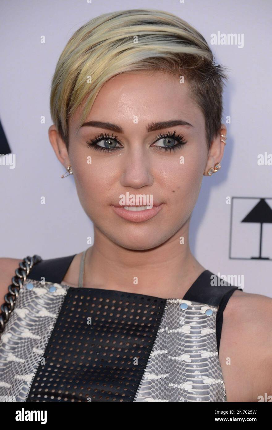 Singer Miley Cyrus arrives at the US premiere of "Paranoia" at the DGA ...