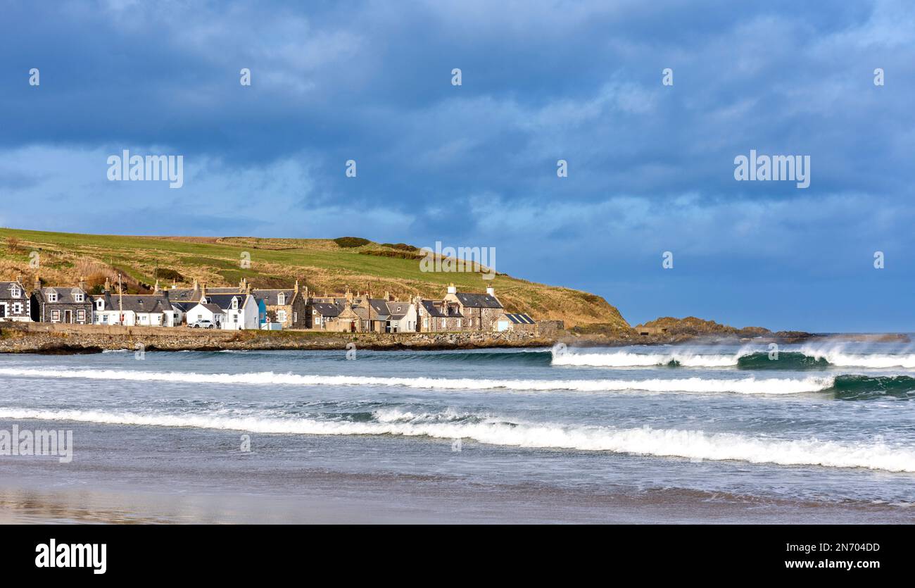 Sandend Village Aberdeenshire Scotland houses and wind swept waves ...