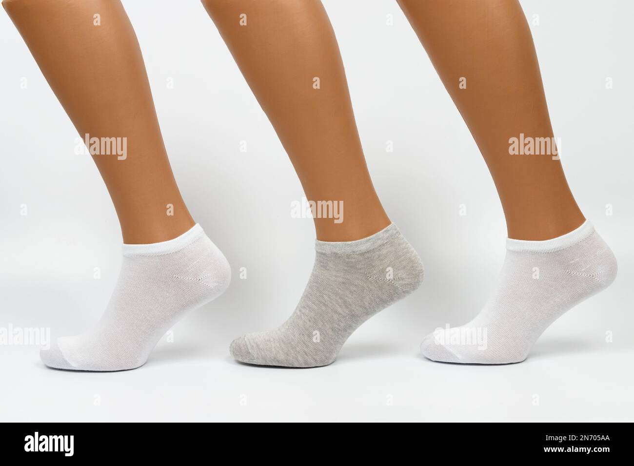 Socks on a white background. Socks on the leg Stock Photo - Alamy