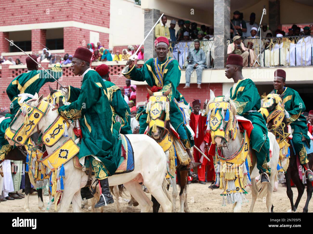 Nigeria muslims ride on horse back during dubar to celebrate Eid al ...