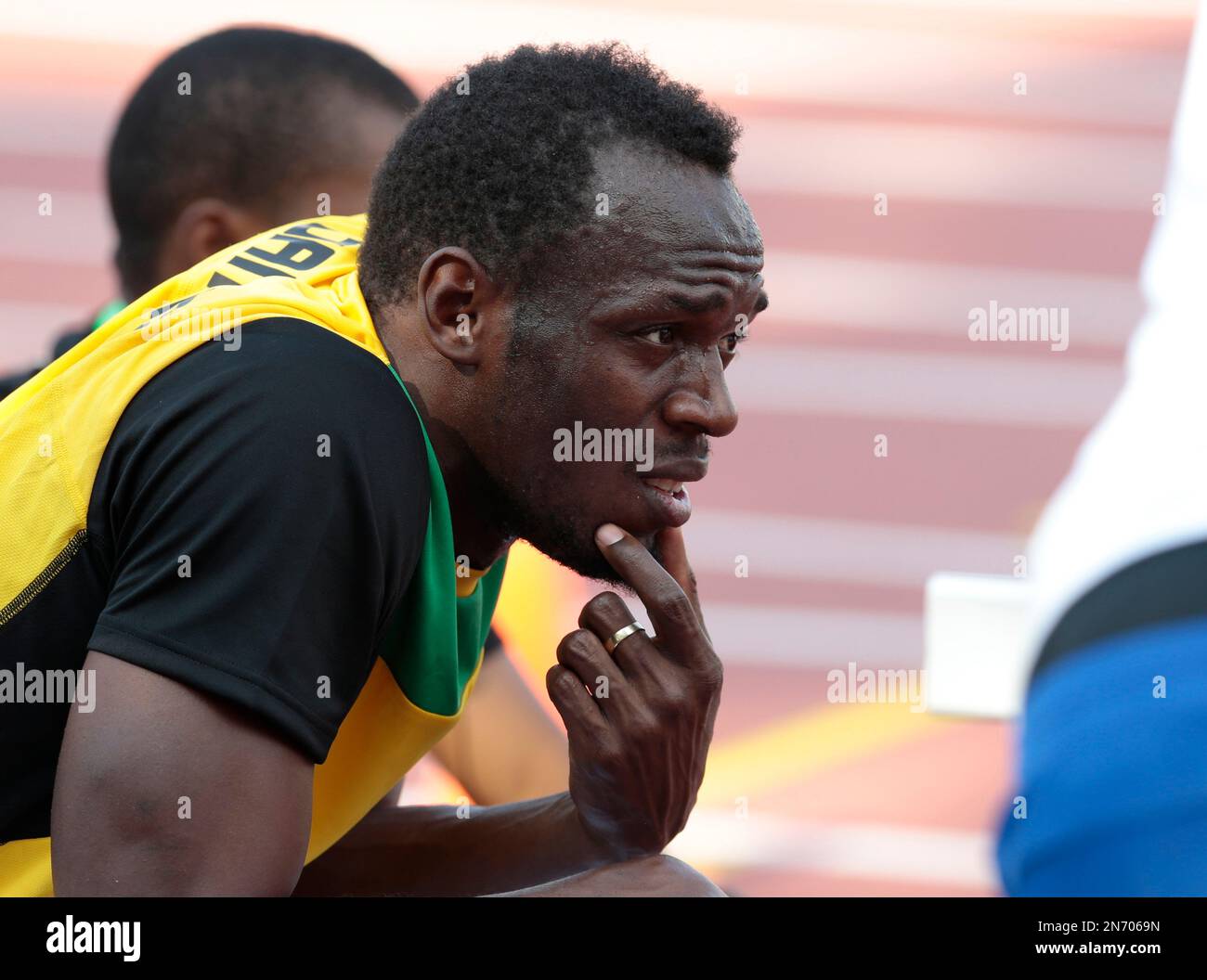 Jamaica's Usain Bolt ponders during a Team Jamaica training session ...