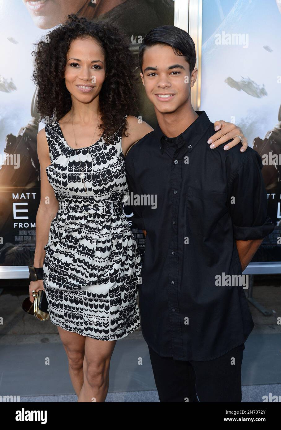 Sherri Saum arrives at the world premiere of "Elysium" at the Regency ...