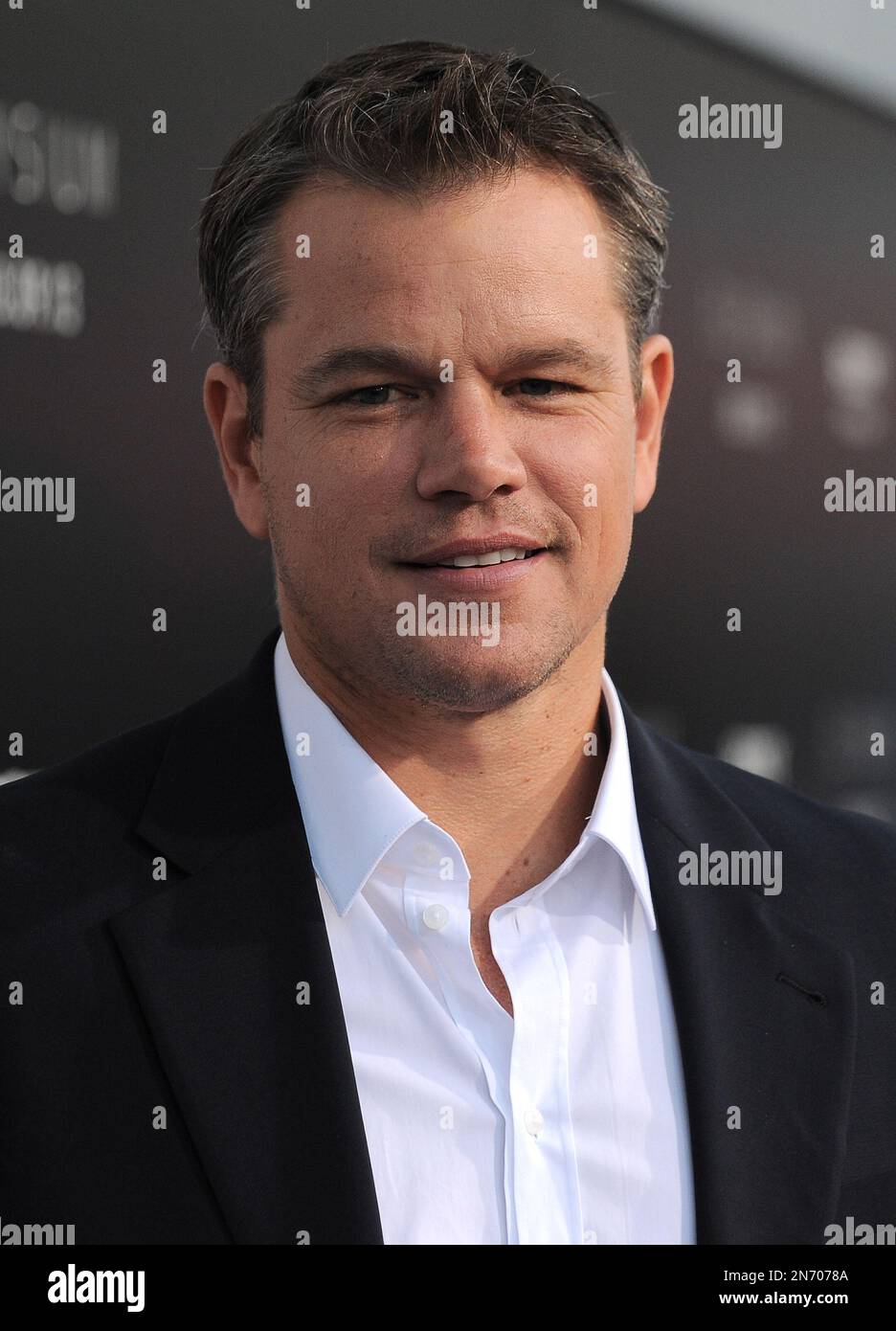 Actor Matt Damon arrives at the world premiere of "Elysium" at the ...