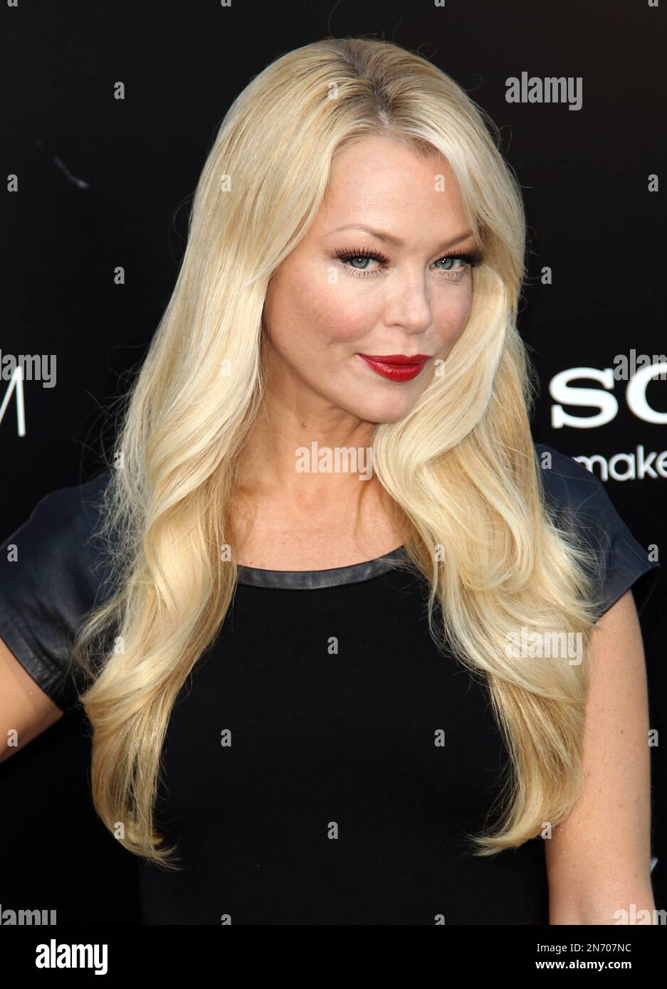 Charlotte Ross arrives at the world premiere of "Elysium" at the ...