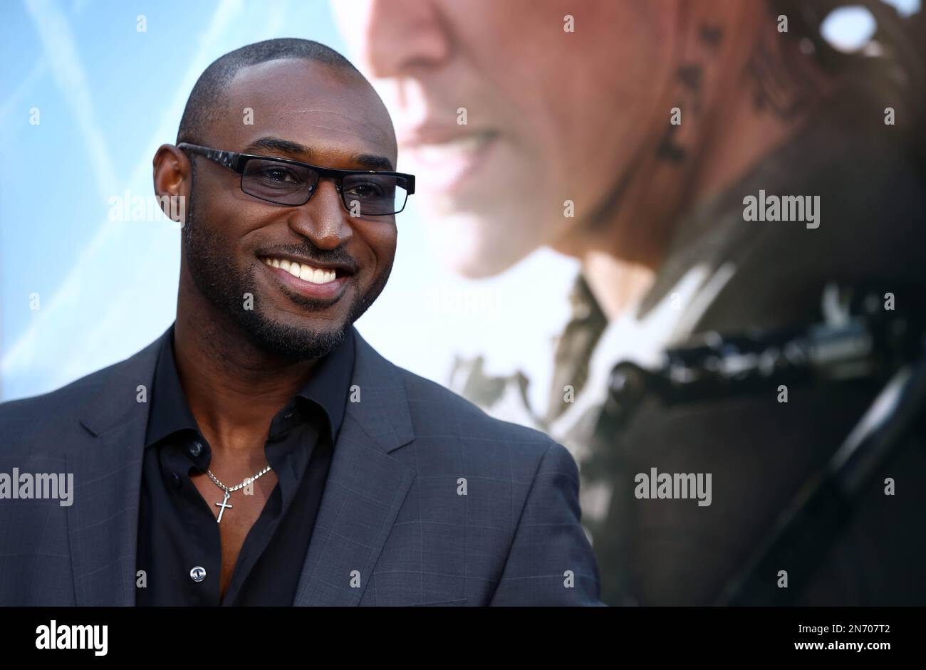Adrian Holmes arrives at the world premiere of "Elysium" at the Regency ...