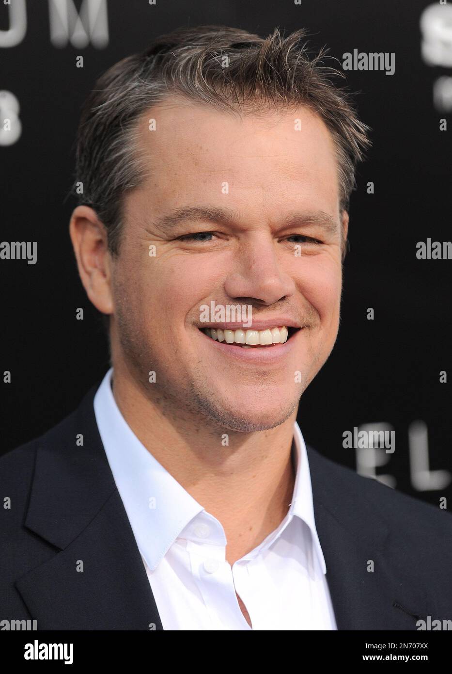 Actor Matt Damon arrives at the world premiere of "Elysium" at the ...