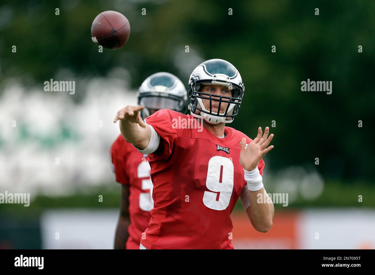 Philadelphia Eagles' Nick Foles throws a pass at a joint workout with ...
