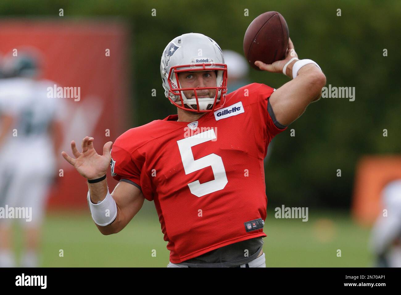 New England Patriots' Tim Tebow throws a pass during a joint workout ...