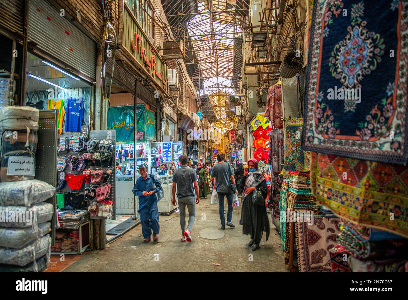 Some people shopping in the Grand Bazaar of Tehran, Iran Stock Photo ...