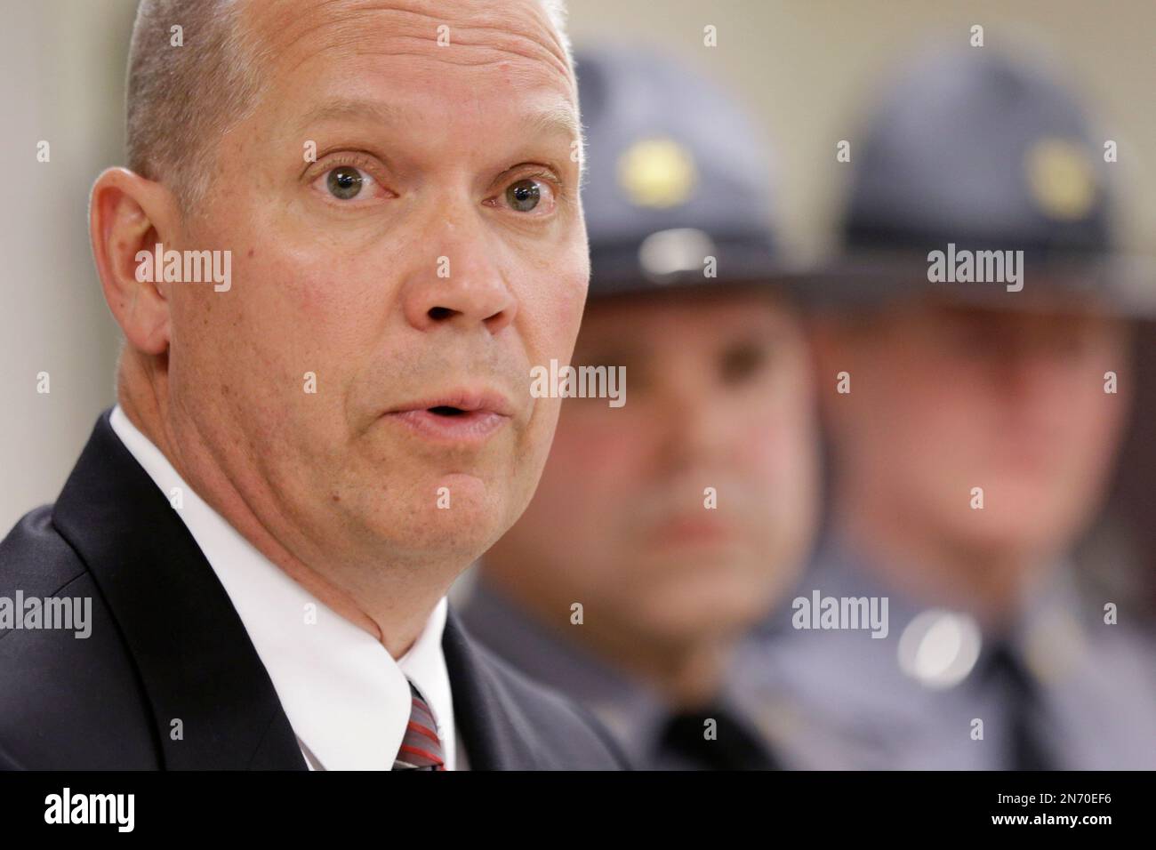 Pennsylvania State Police Lt. Robert Bartal, left, and accompanied by ...