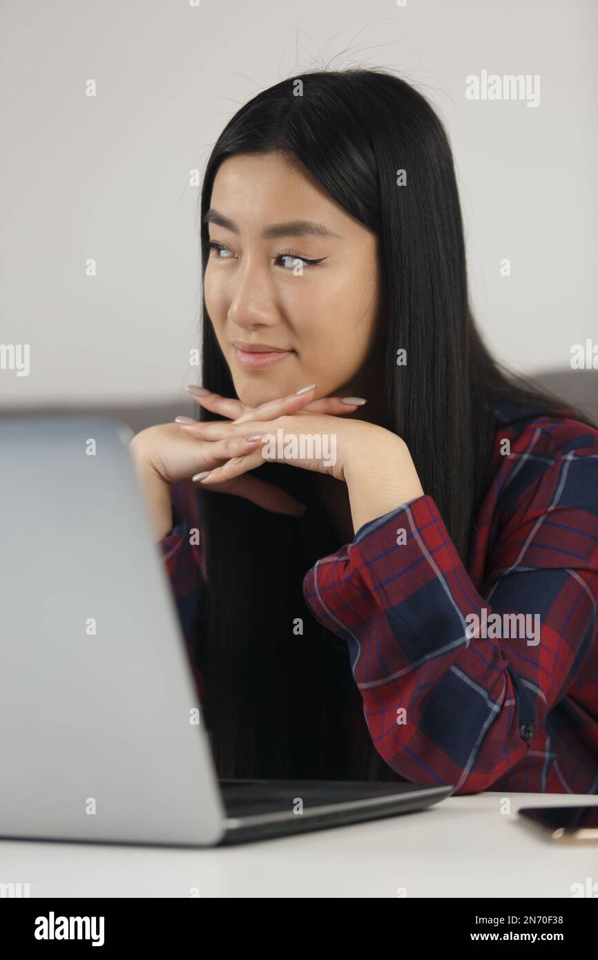 Excited Asian girl thinking about success. Portrait of beautiful ...