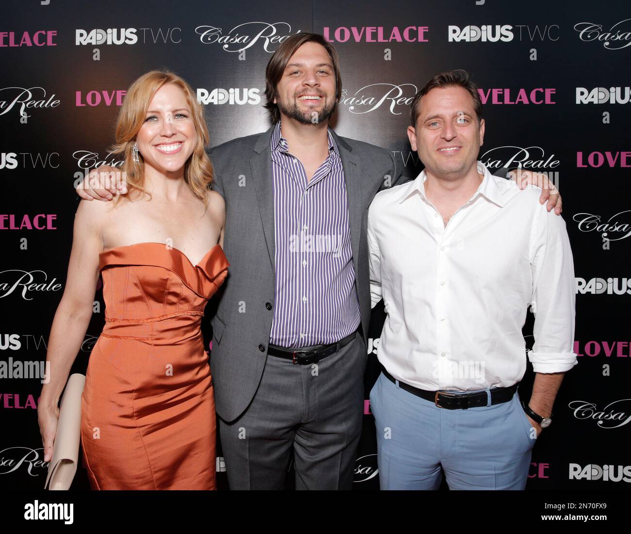 Producers Jim Young, Laura Rister and screenwriter Andy Bellin attend ...