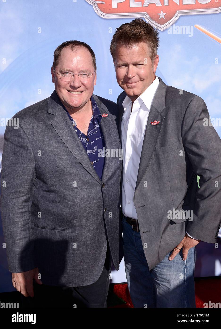 From left to right, executive John Lasseter and director Klay Hall ...