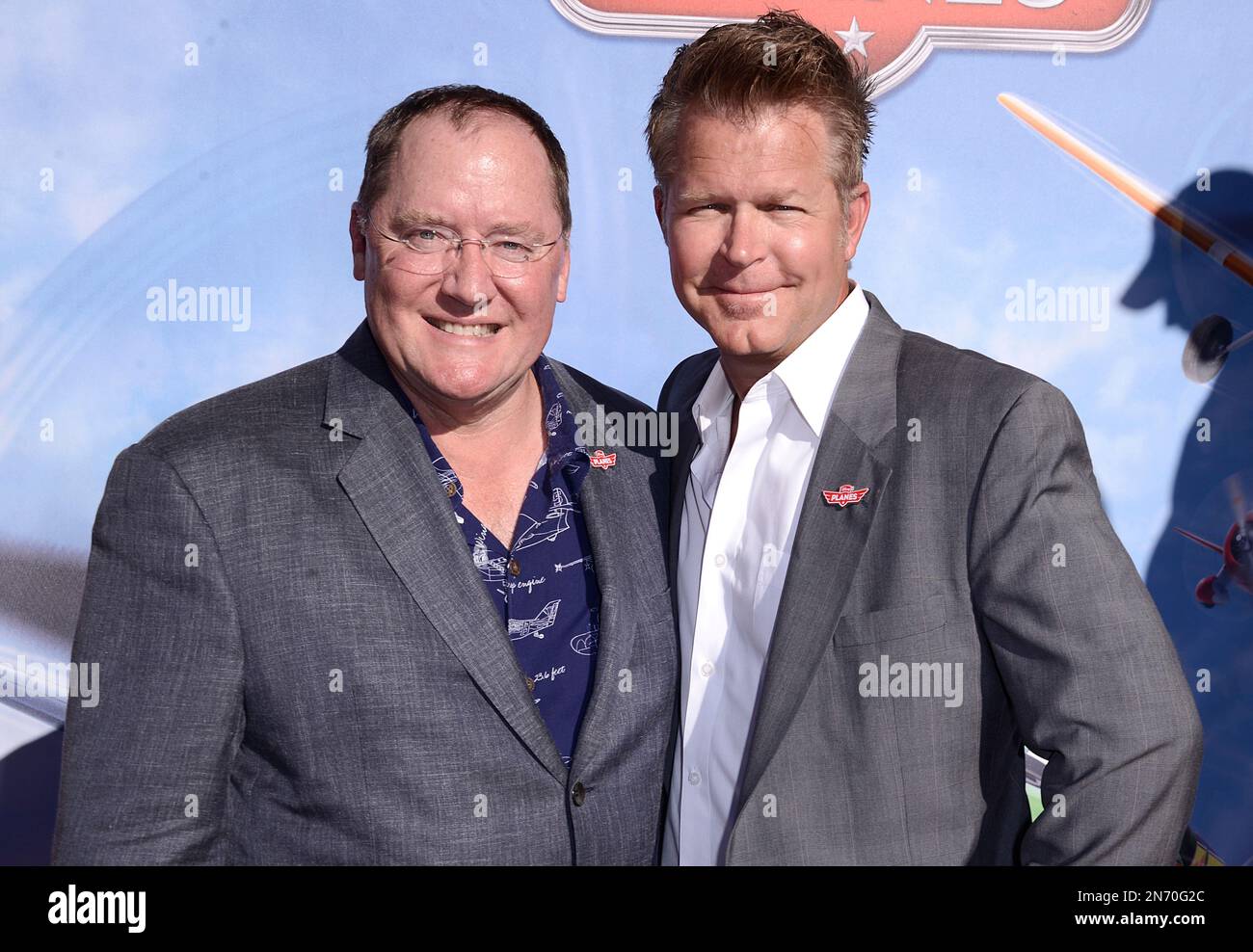 From left to right, executive John Lasseter and director Klay Hall ...