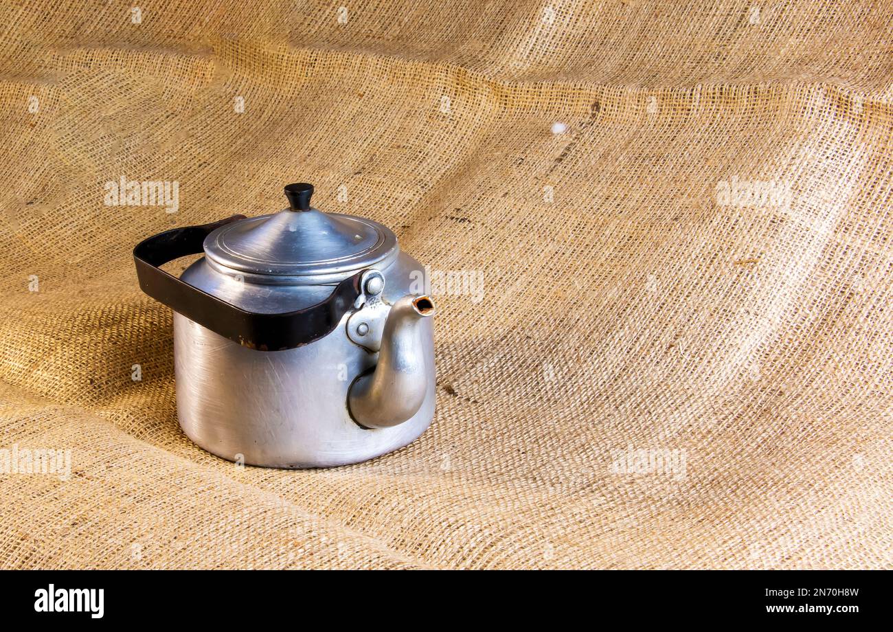 An old soldier's aluminum teapot from the Second World War against the ...