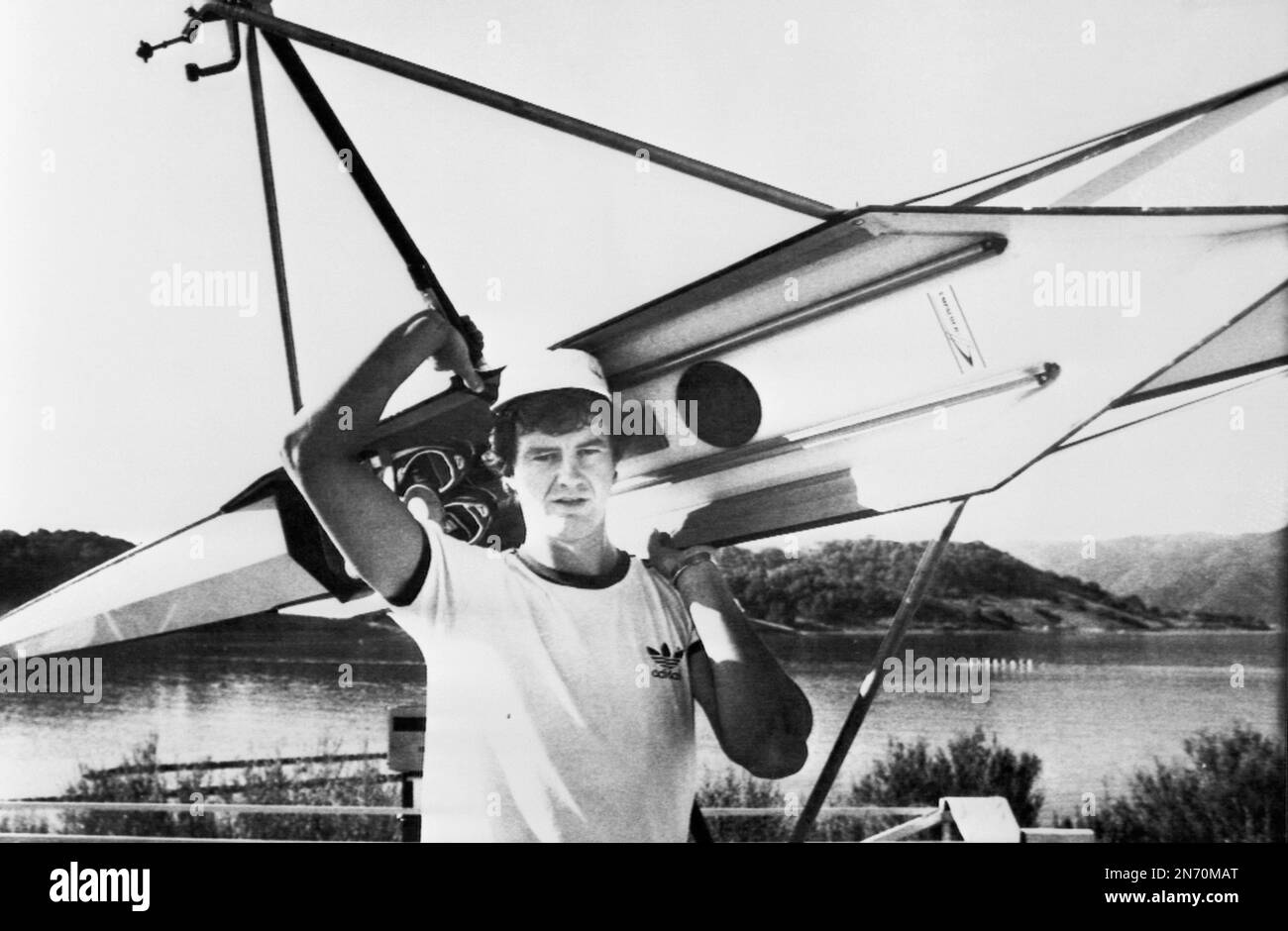 West German rower Peter Michael Kolbe holds his boat as he goes for a ...