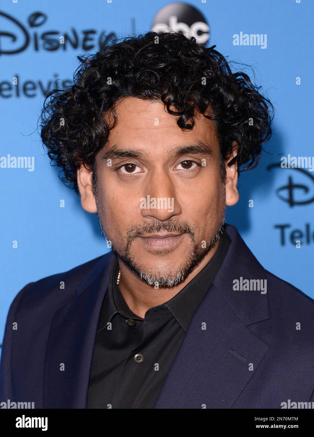 Actor Naveen Andrews arrives at the Disney/ABC 2013 Summer TCA Party at ...