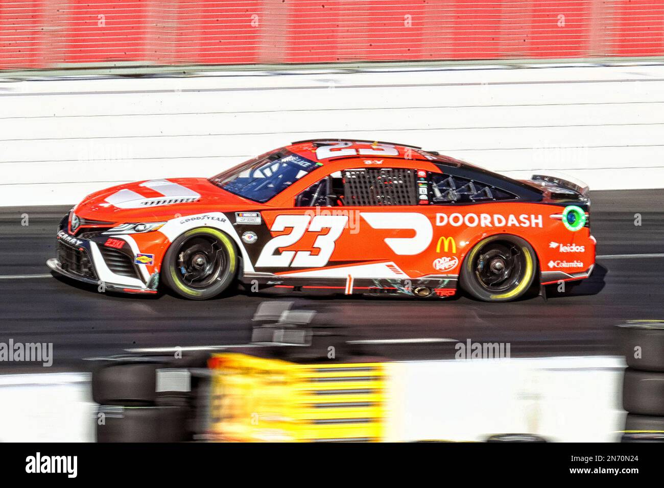 NASCAR Cup Series driver Bubba Wallace (23) races during the Busch ...