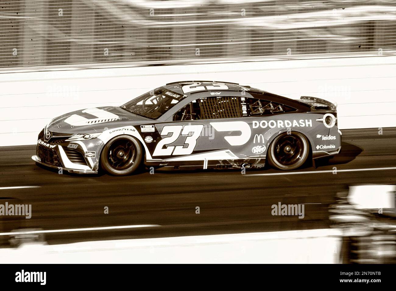 NASCAR Cup Series driver Bubba Wallace (23) races during the Busch ...