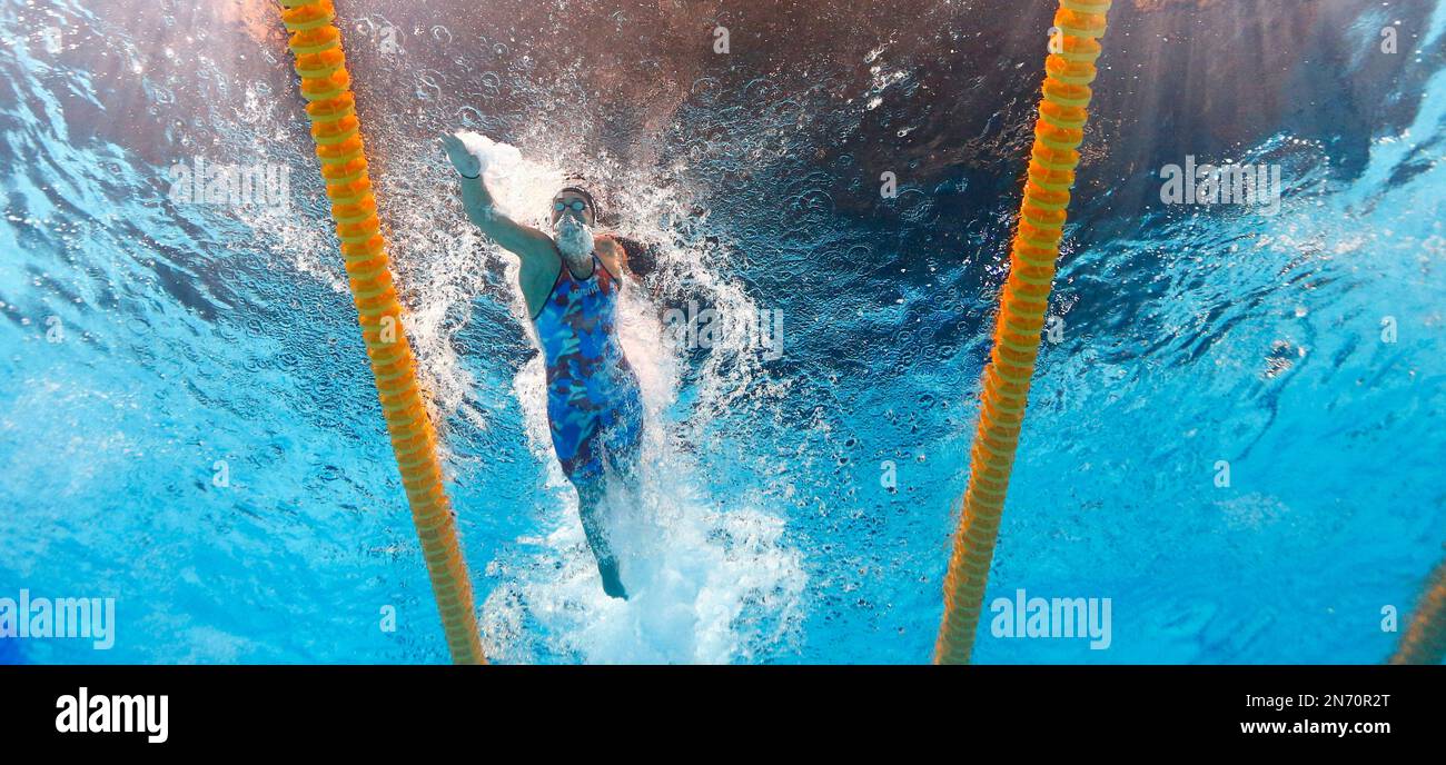 Megan Romano of the United States swims the anchor leg in the Women's ...