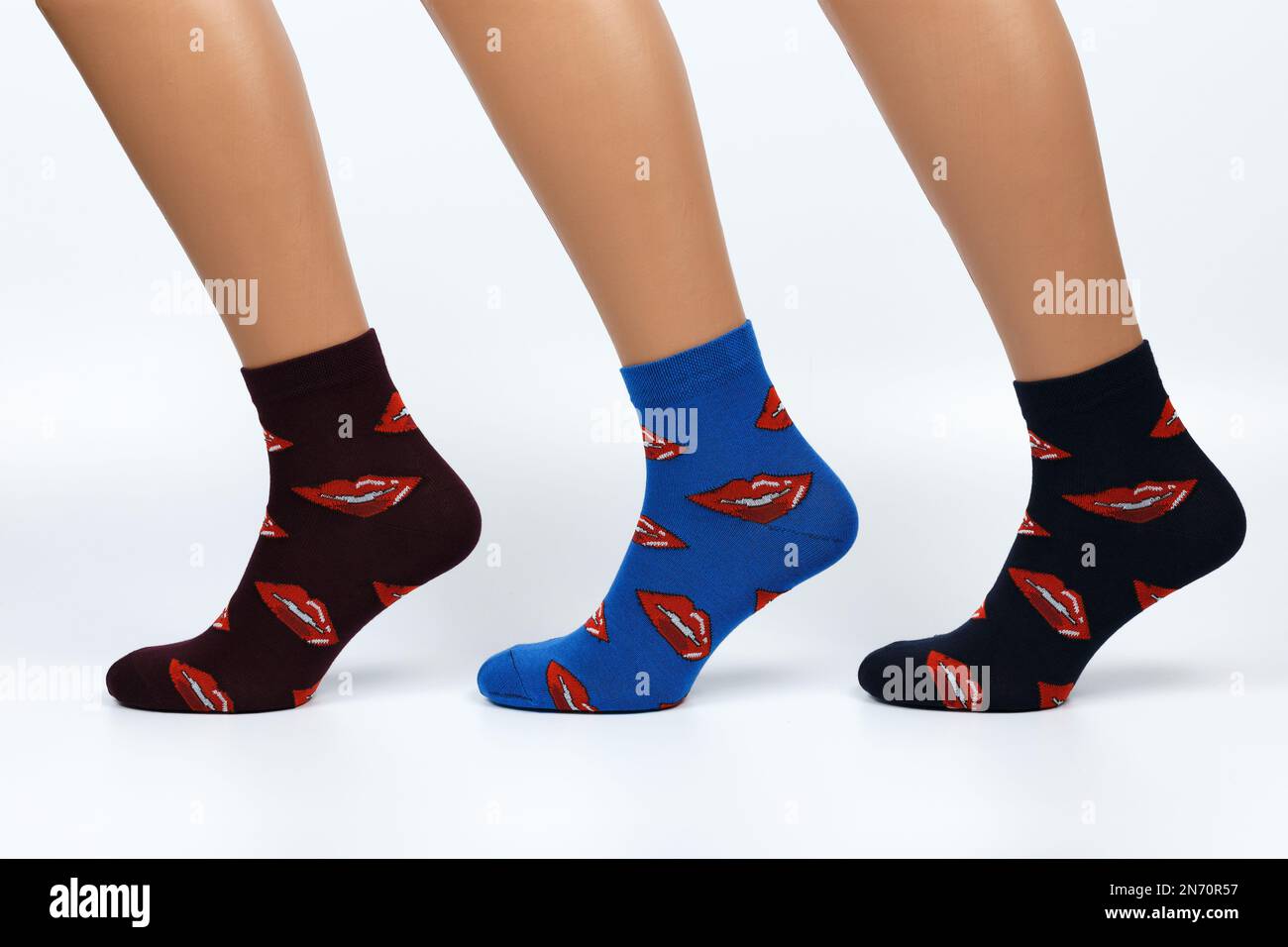 Socks on a white background. Socks on the leg Stock Photo - Alamy