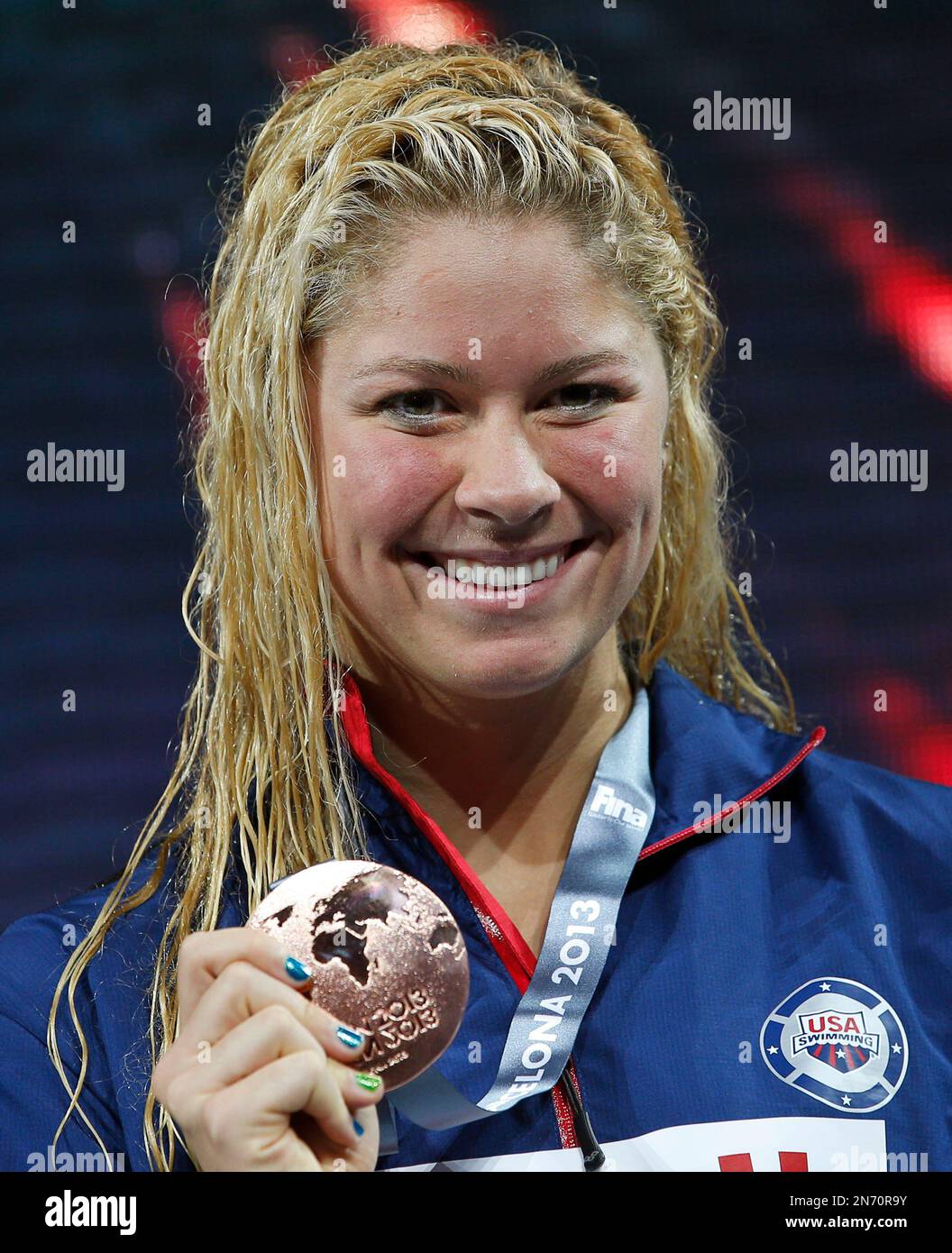 United States's Elizabeth Beisel smiles as she holds the bronze medal ...