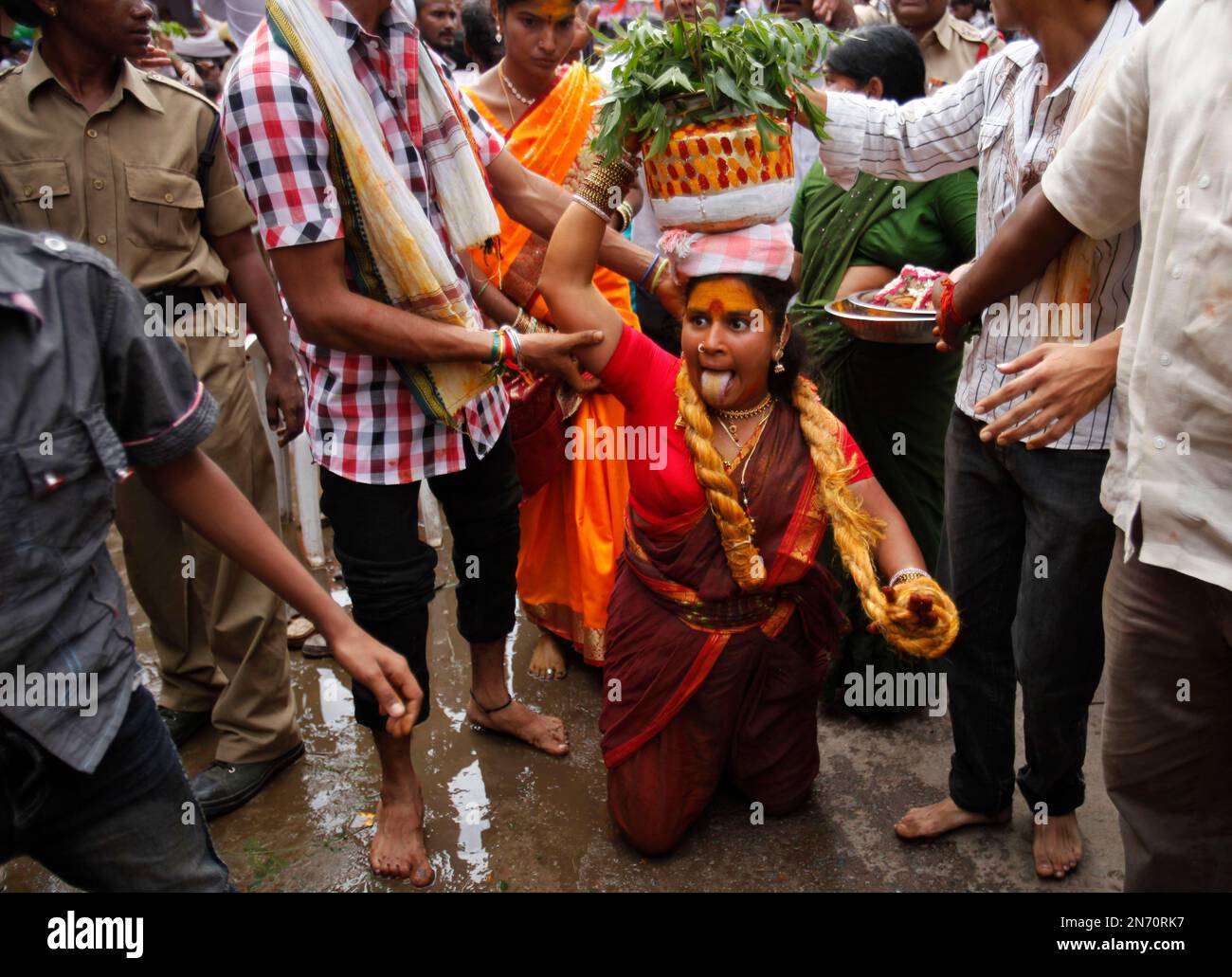 An Indian woman performs a ritual during the Bonalu festival in ...