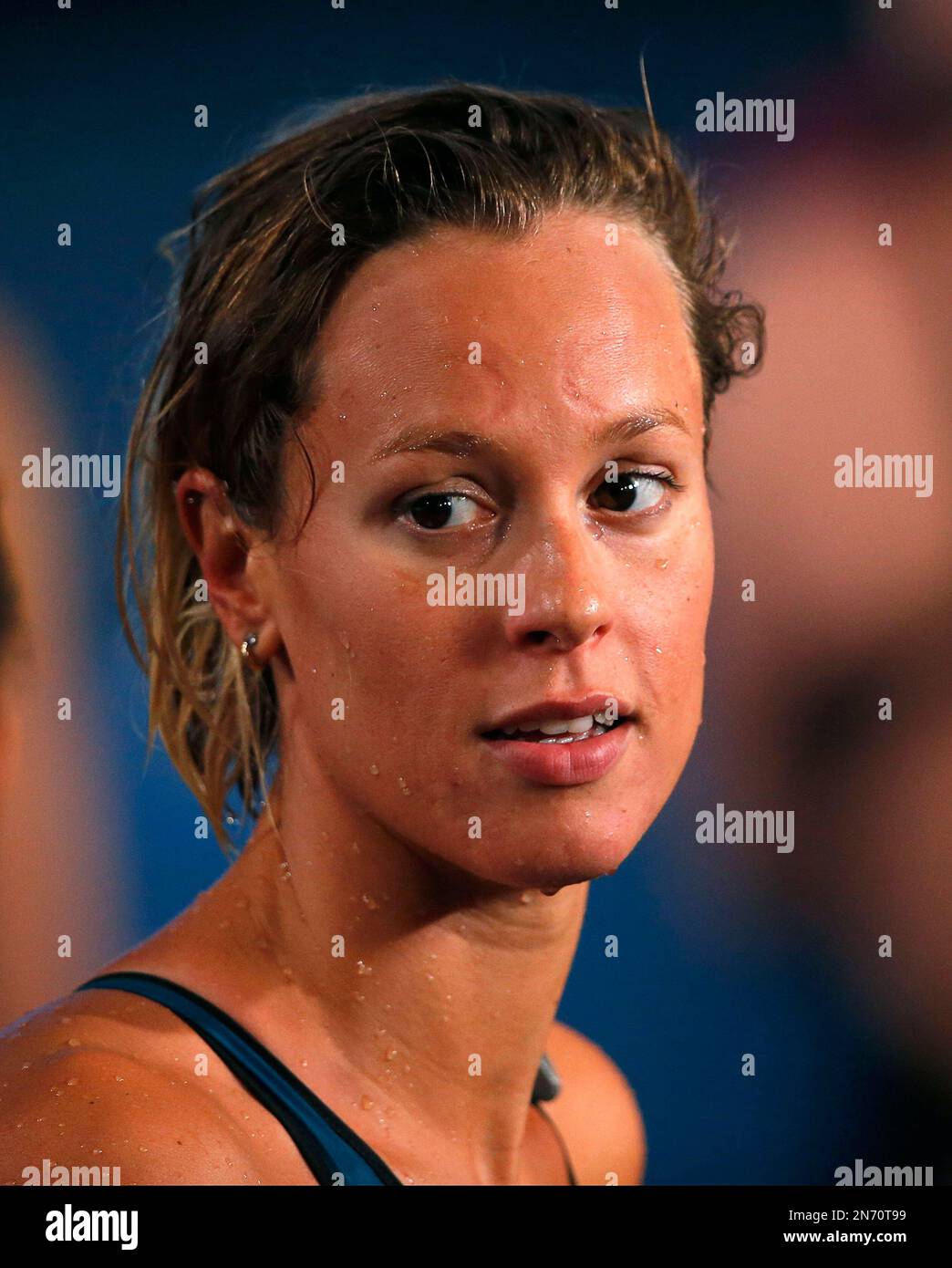 Italy's Federica Pellegrini stands near the pool after swimming in a ...