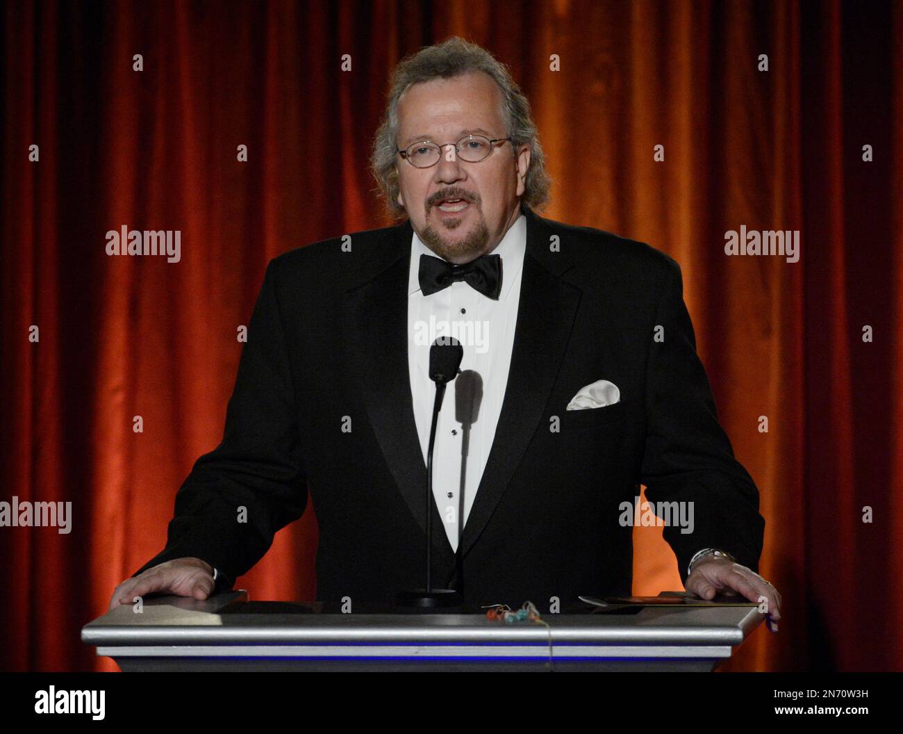 Presenter Barry Kibrick, of KLCS, speaks on stage at the 65th Los ...