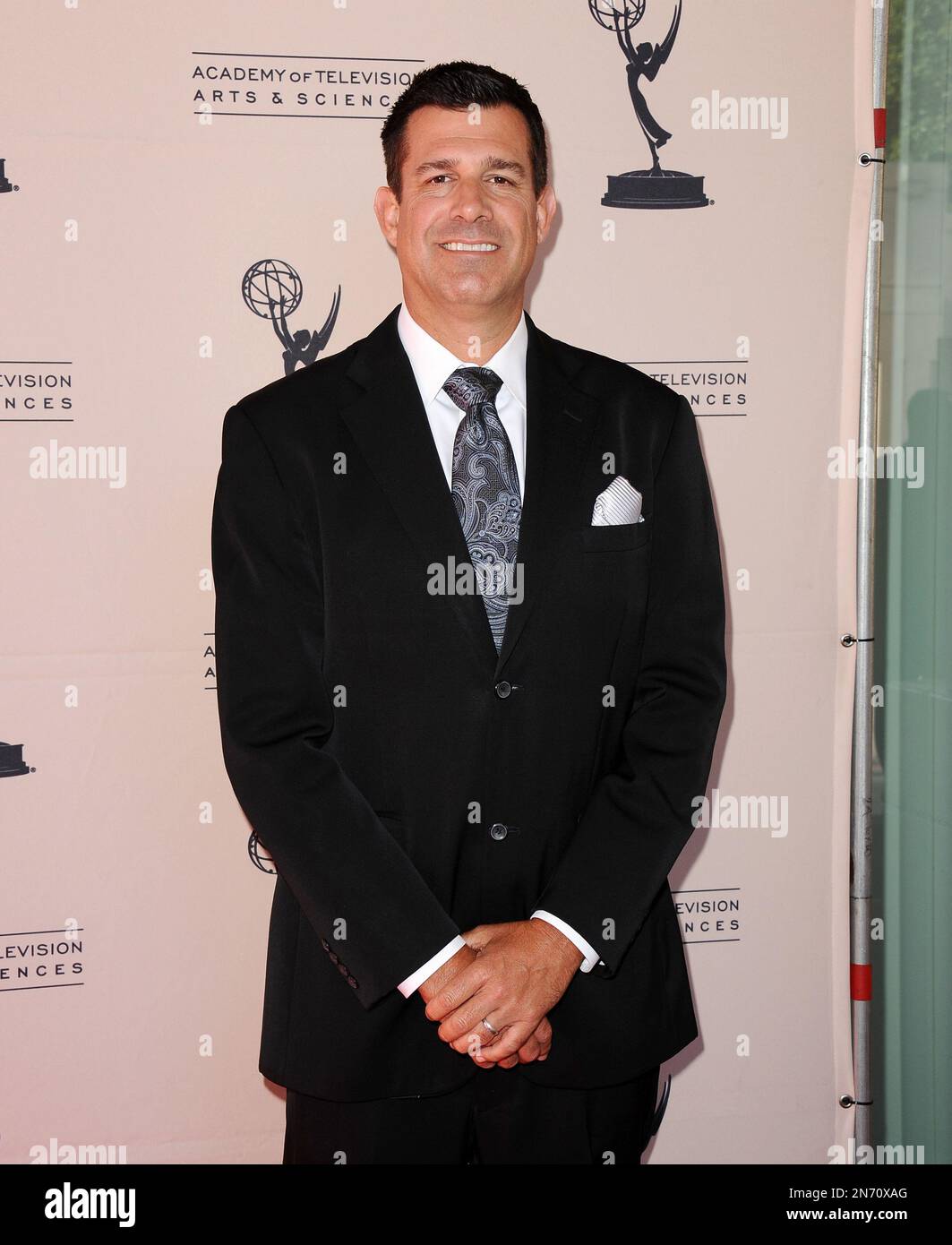 Chris McGee, of Time Warner Cable SportsNet, arrives at the 65th Los Angeles Area Emmy Awards at ...