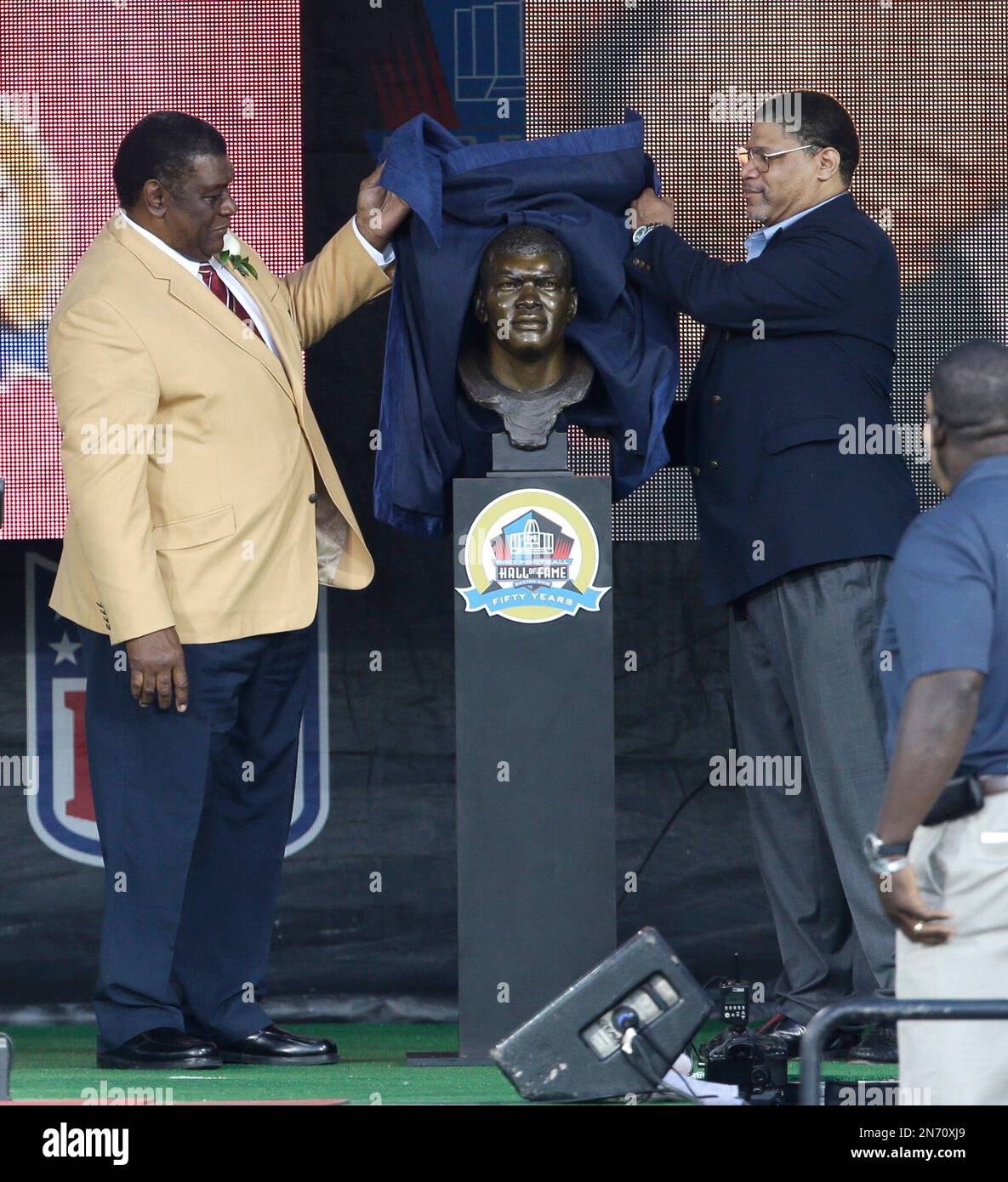 Former NFL football player Dave Robinson, left, and his son, David ...