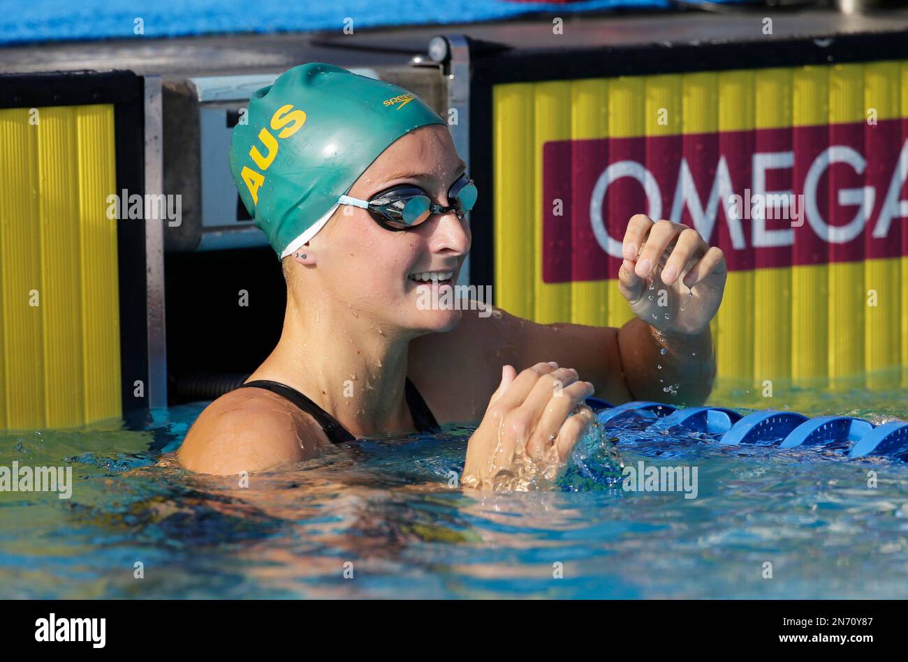 Leiston Pickett, of Australia, looks at the scoreboard after competing ...