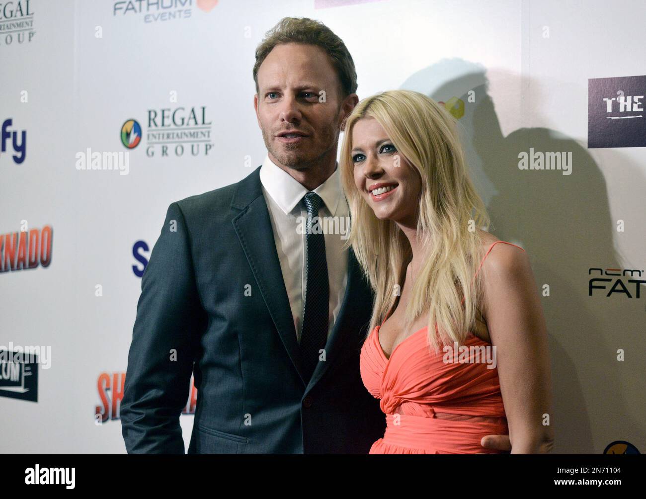 Ian Ziering, left, and Tara Reid arrive at the premiere of "Sharknado ...