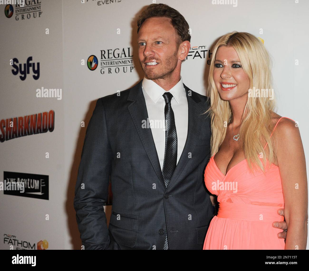 Ian Ziering, left, and Tara Reid arrive at the premiere of "Sharknado ...
