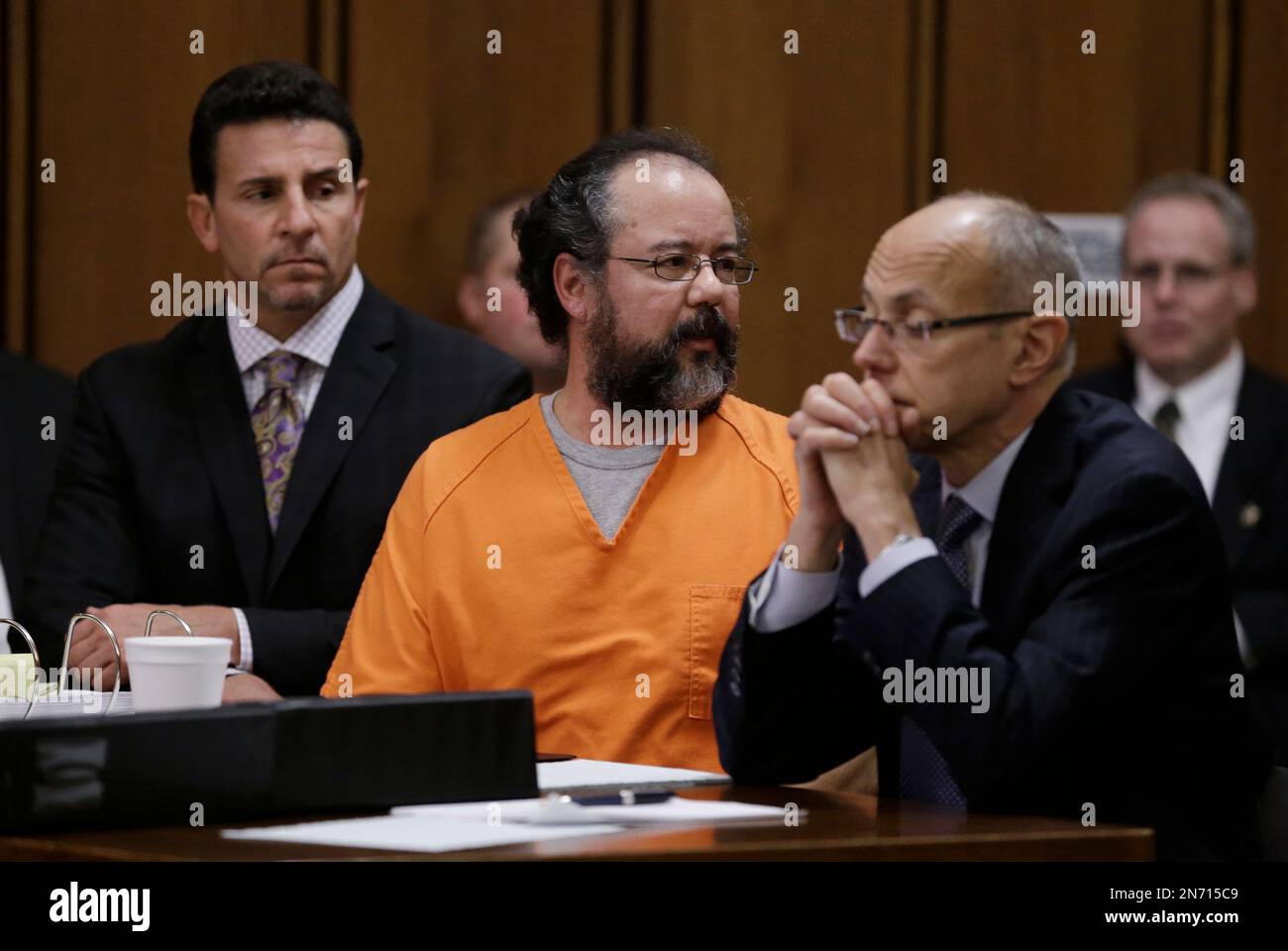 Ariel Castro looks toward Michelle Knight as he makes a statement in ...