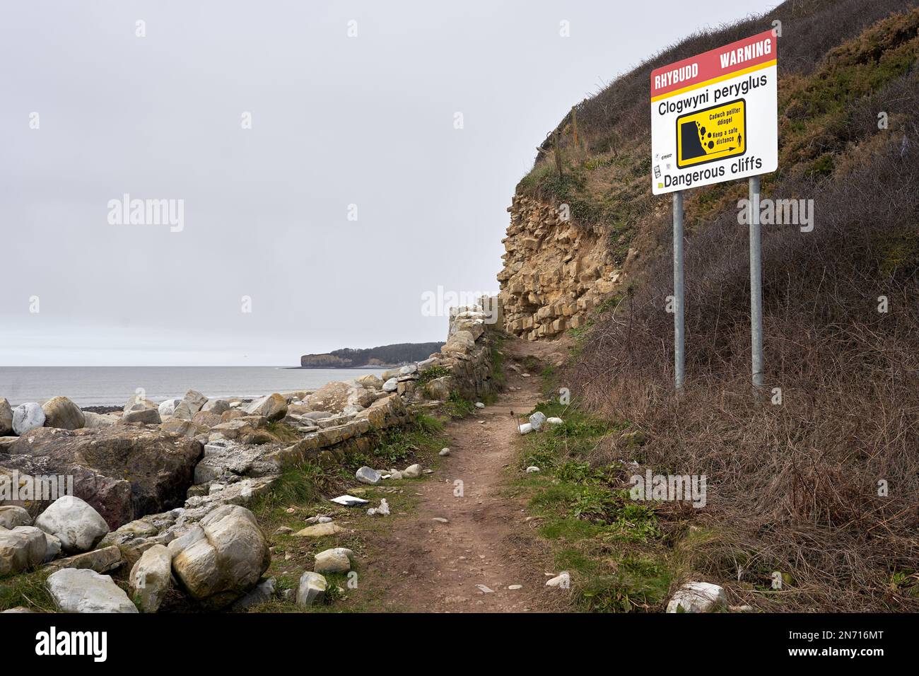 The beach and cliff warning sign at Llantwit Major in the Vale of ...