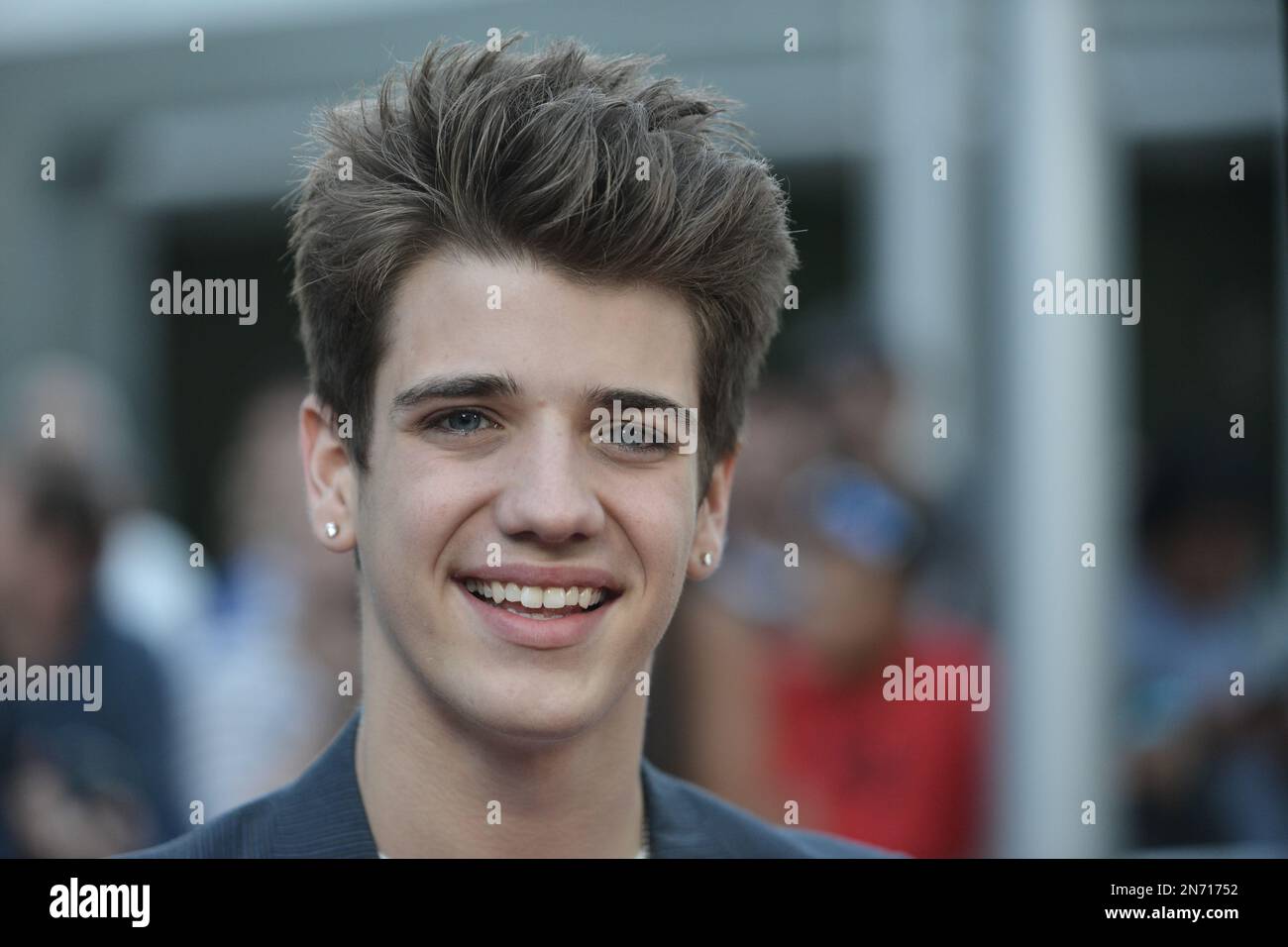 Brandon Tyler Russell arrives at a special screening for "I Give It A ...