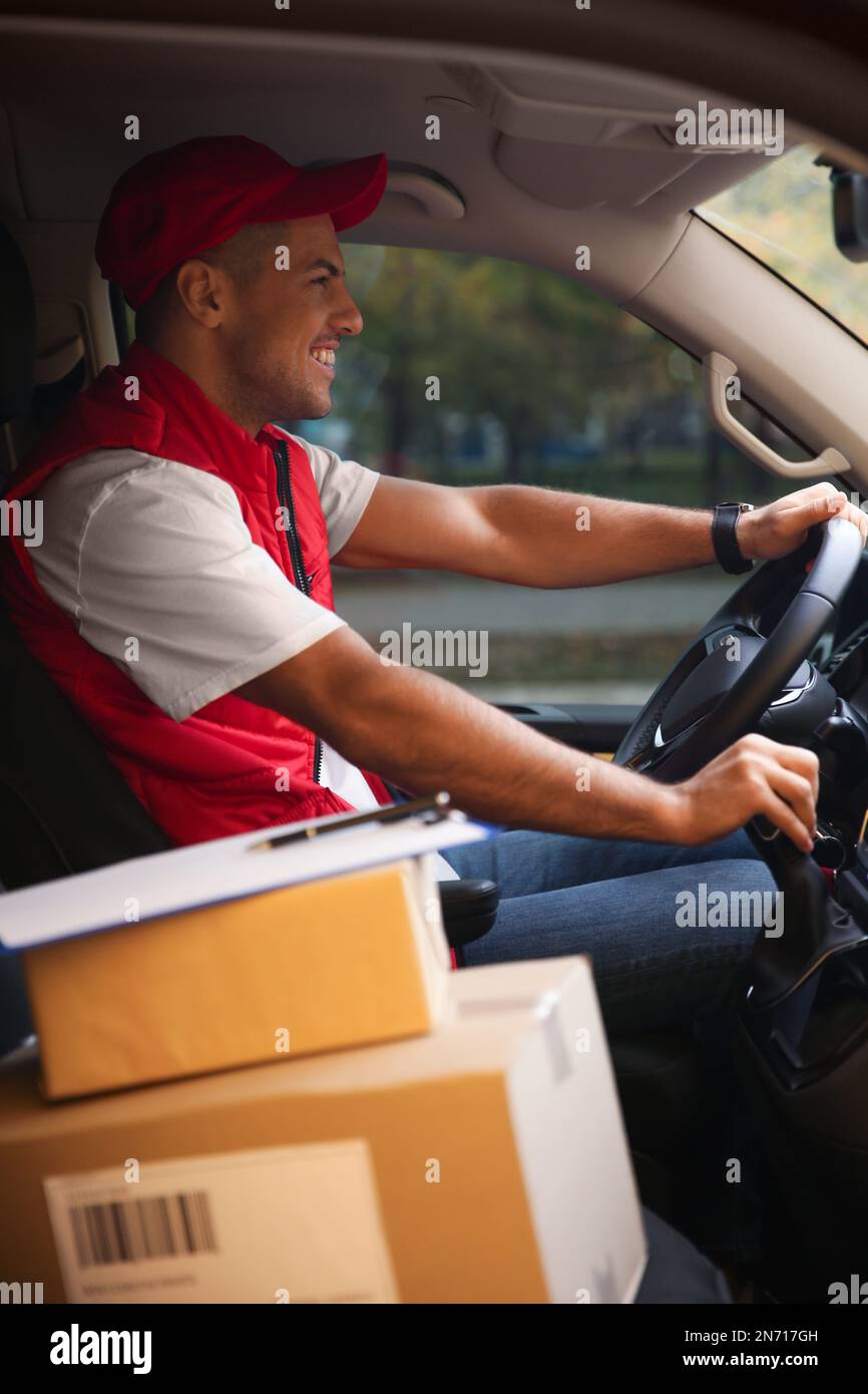 Courier driver in uniform hi-res stock photography and images - Alamy
